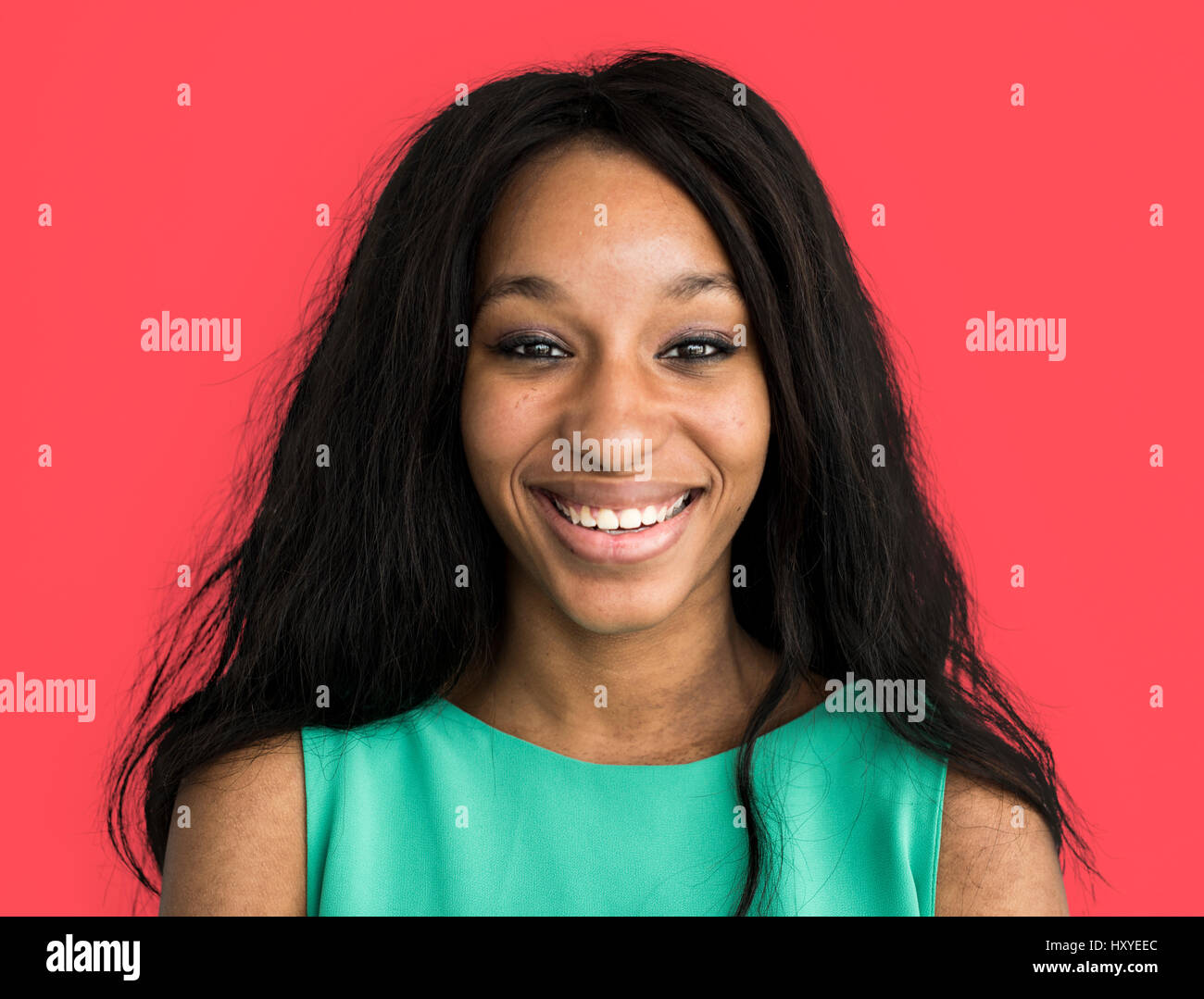 Casual Woman Smiling Studio Stock Photo - Alamy