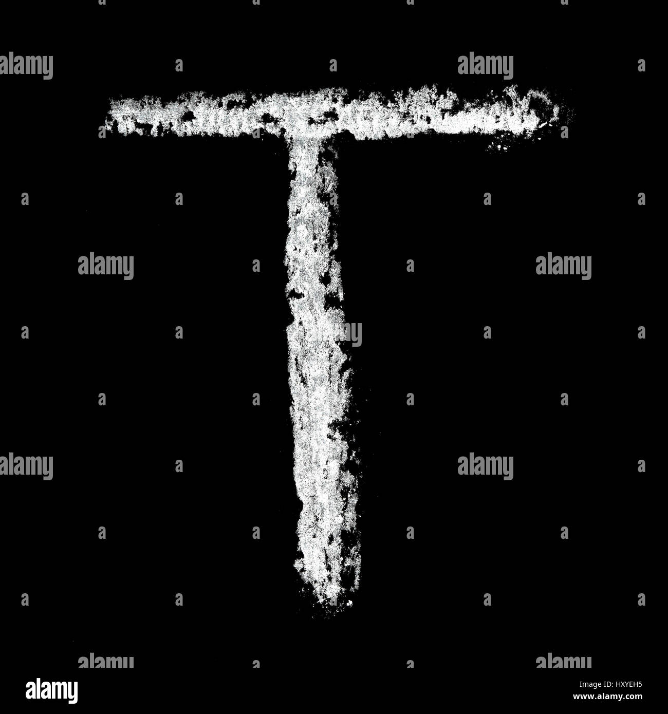 T - Chalk alphabet over black background Stock Photo - Alamy