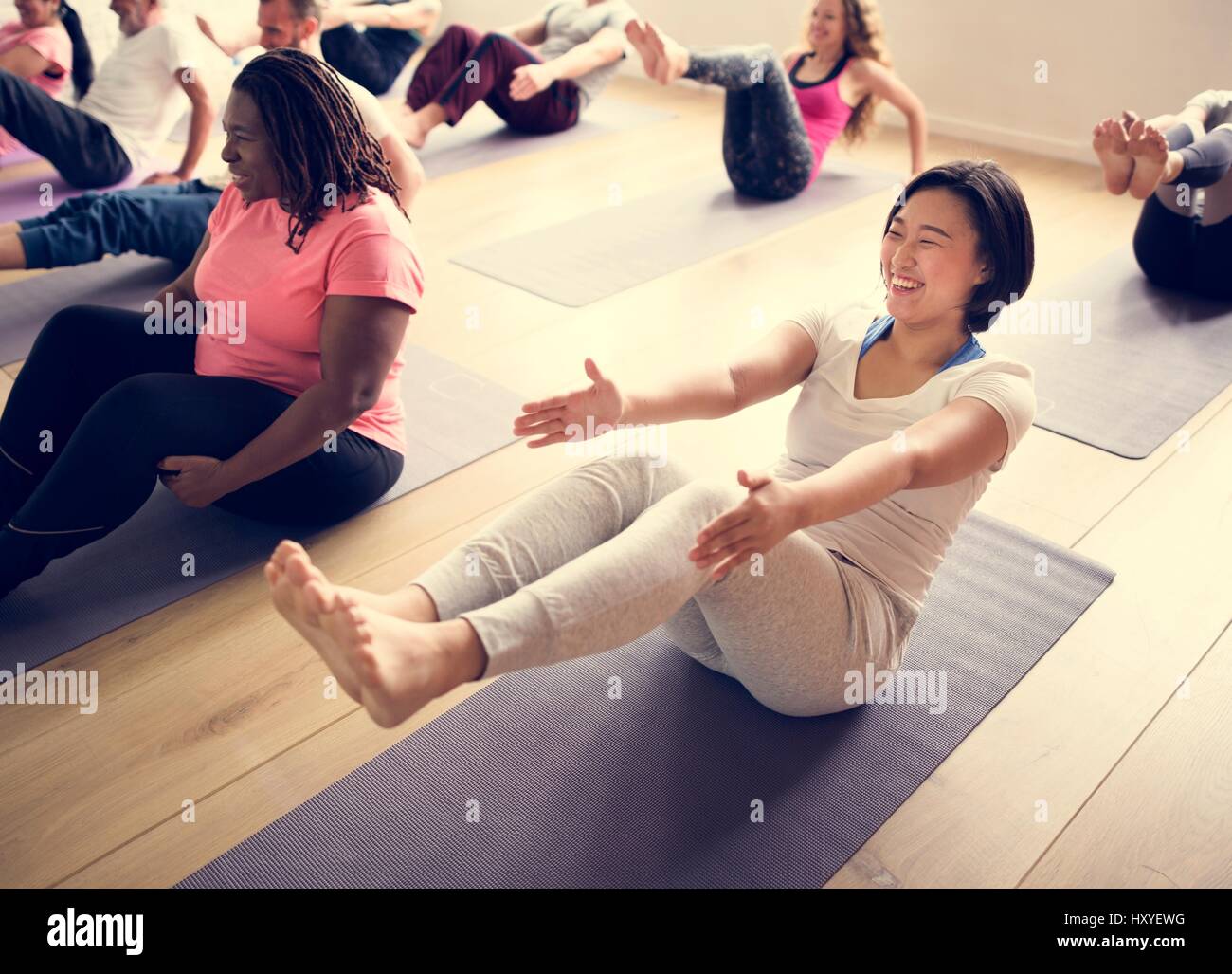 Exercise International Group Relaxation Fitness Concept Stock Photo - Alamy