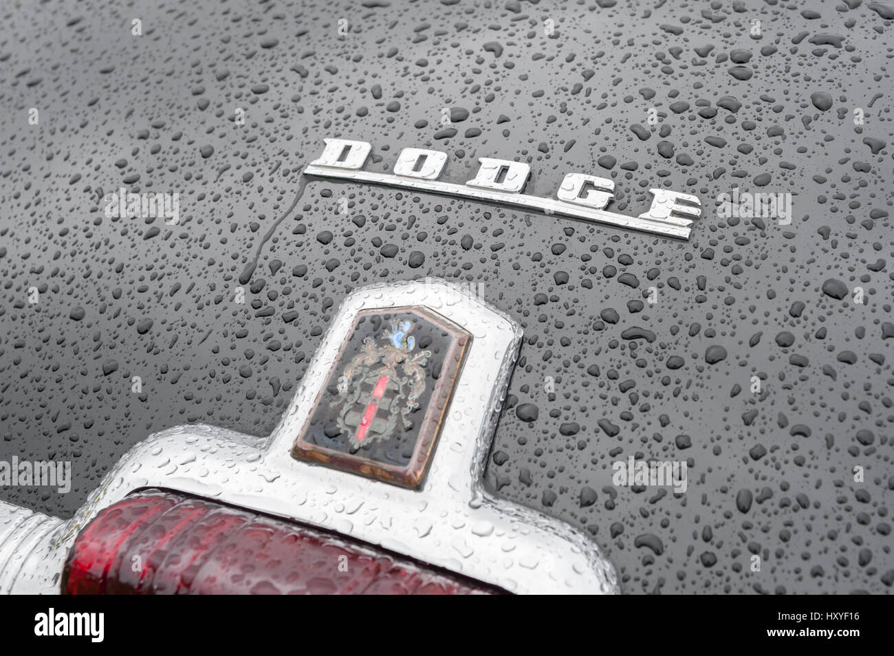 Rushmoor, UK - April 3, 2015: Closeup of raindrop covered badges on a ...