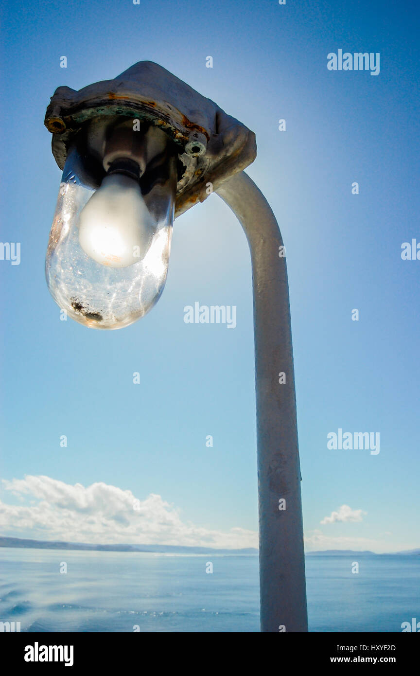 Ferry Lamp photographed against Blue Sky Stock Photo - Alamy