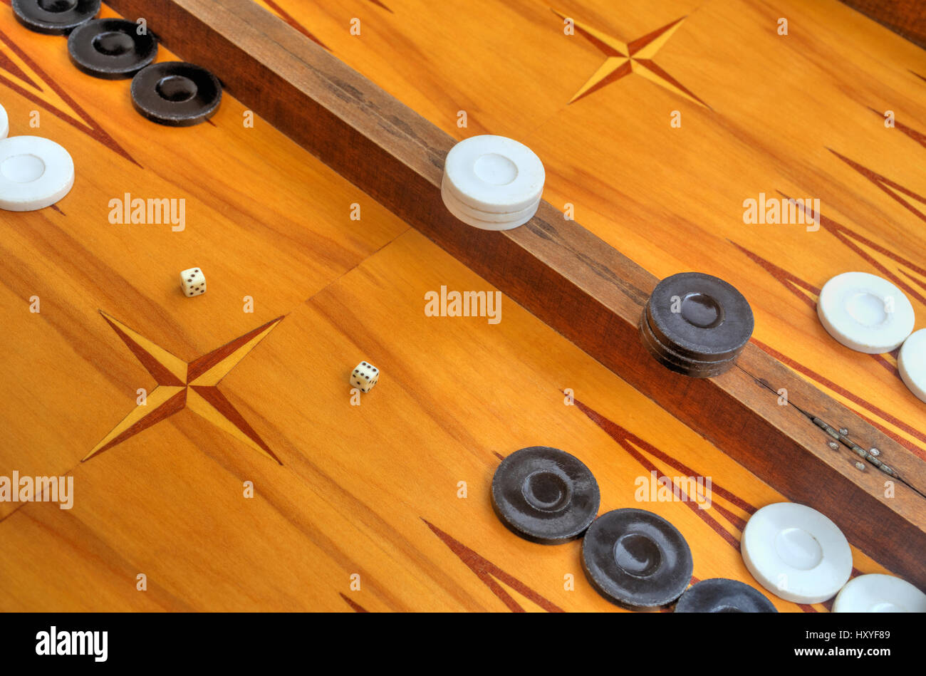 Wooden board for playing backgammon game with pools and dice Stock ...