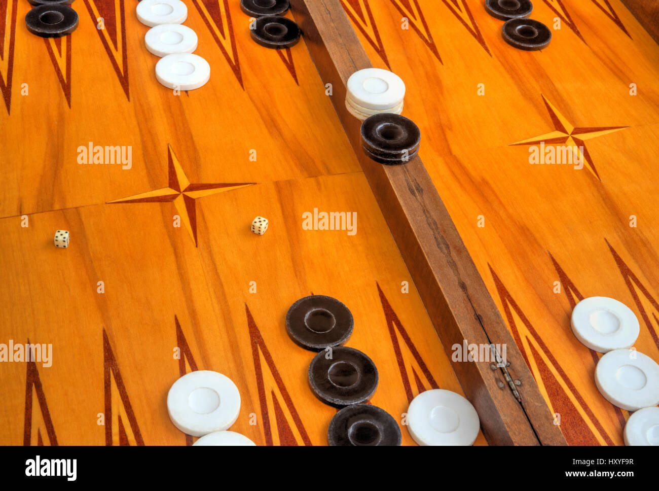 Wooden board for playing backgammon game with pools and dice Stock ...