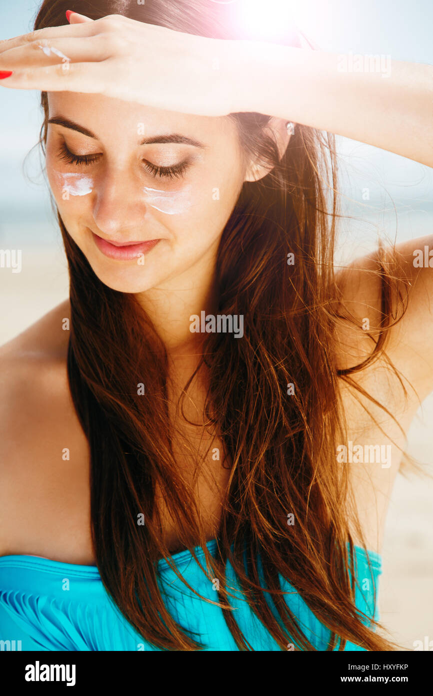 Suncream face girl hi-res stock photography and images - Alamy