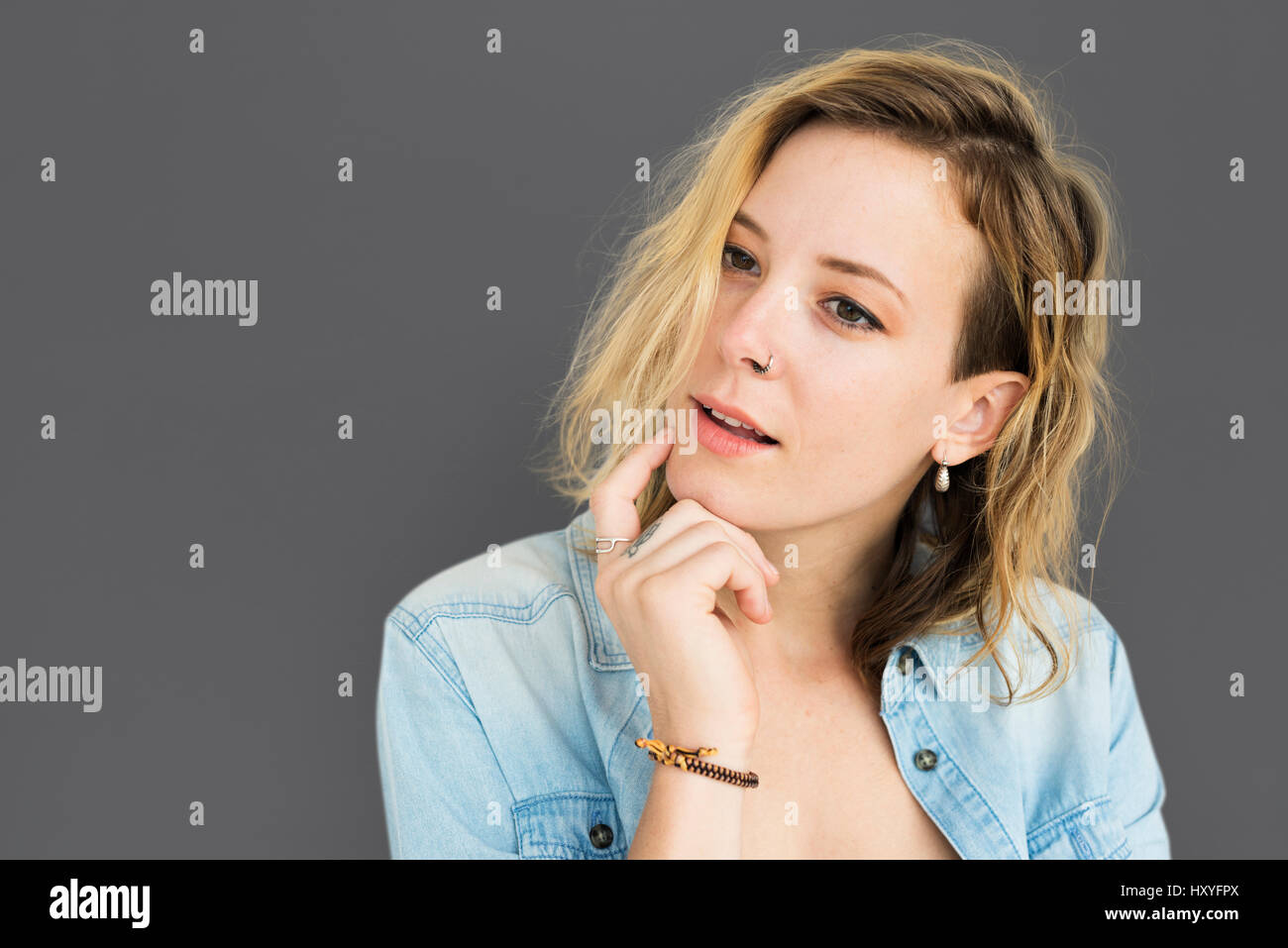 Smiling and thinking hi-res stock photography and images - Alamy