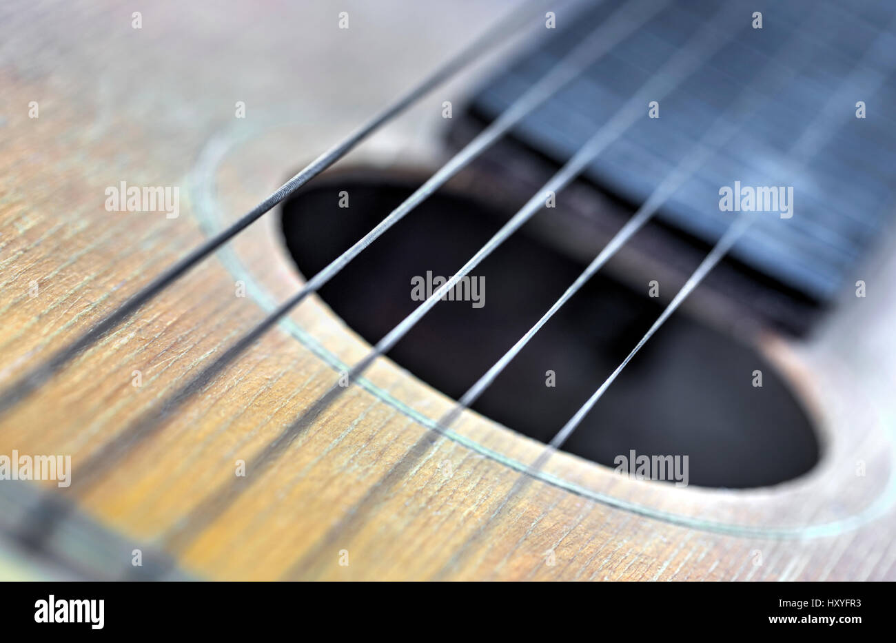 Wooden acoustic guitar closeup Stock Photo - Alamy