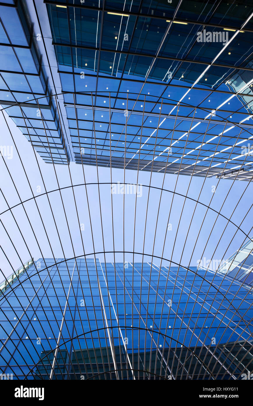 Wire tree sculptures and office buildings. Canary Wharf. London Stock ...