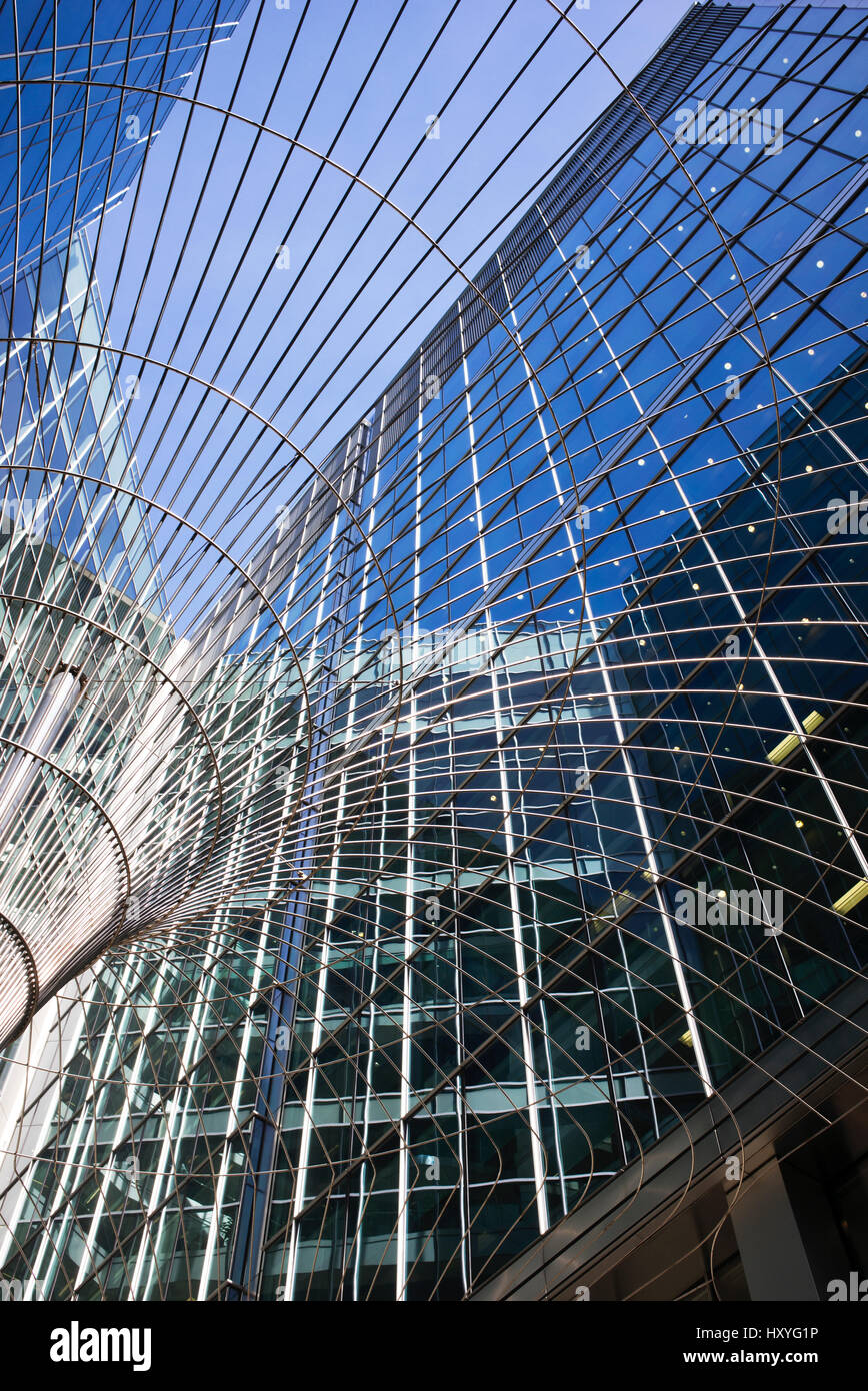 Wire tree sculptures and office buildings. Canary Wharf. London Stock ...