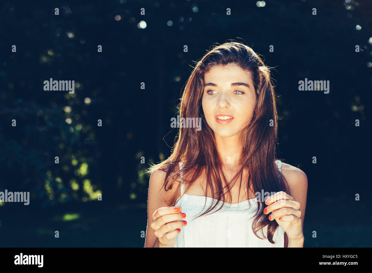 Anguished woman outdoors Stock Photo - Alamy