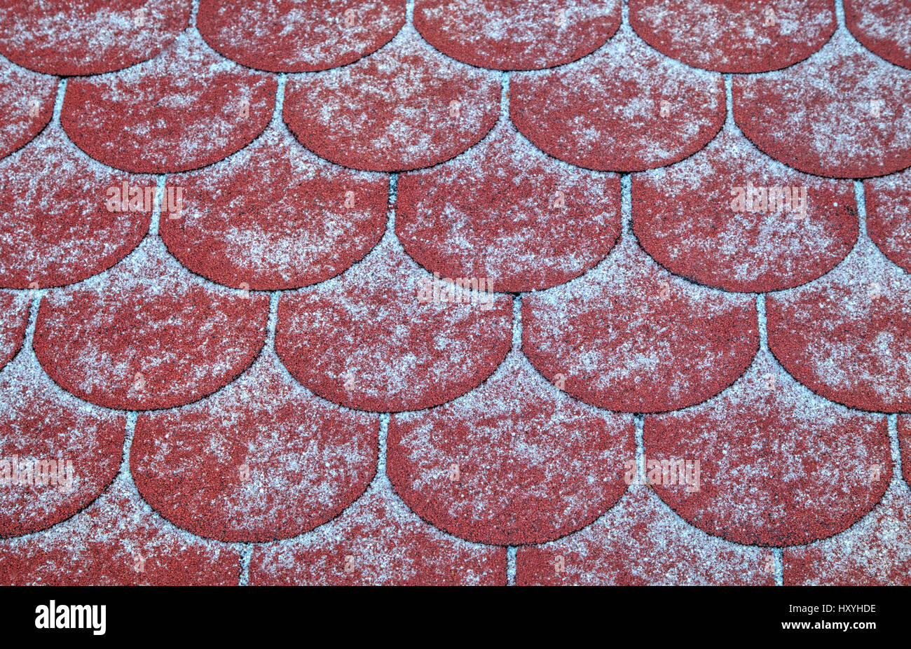Red roof covered with snow Stock Photo - Alamy
