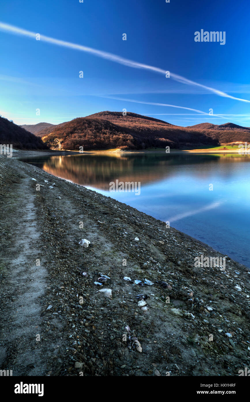 Beautiful landscape with pond and blue sky Stock Photo - Alamy