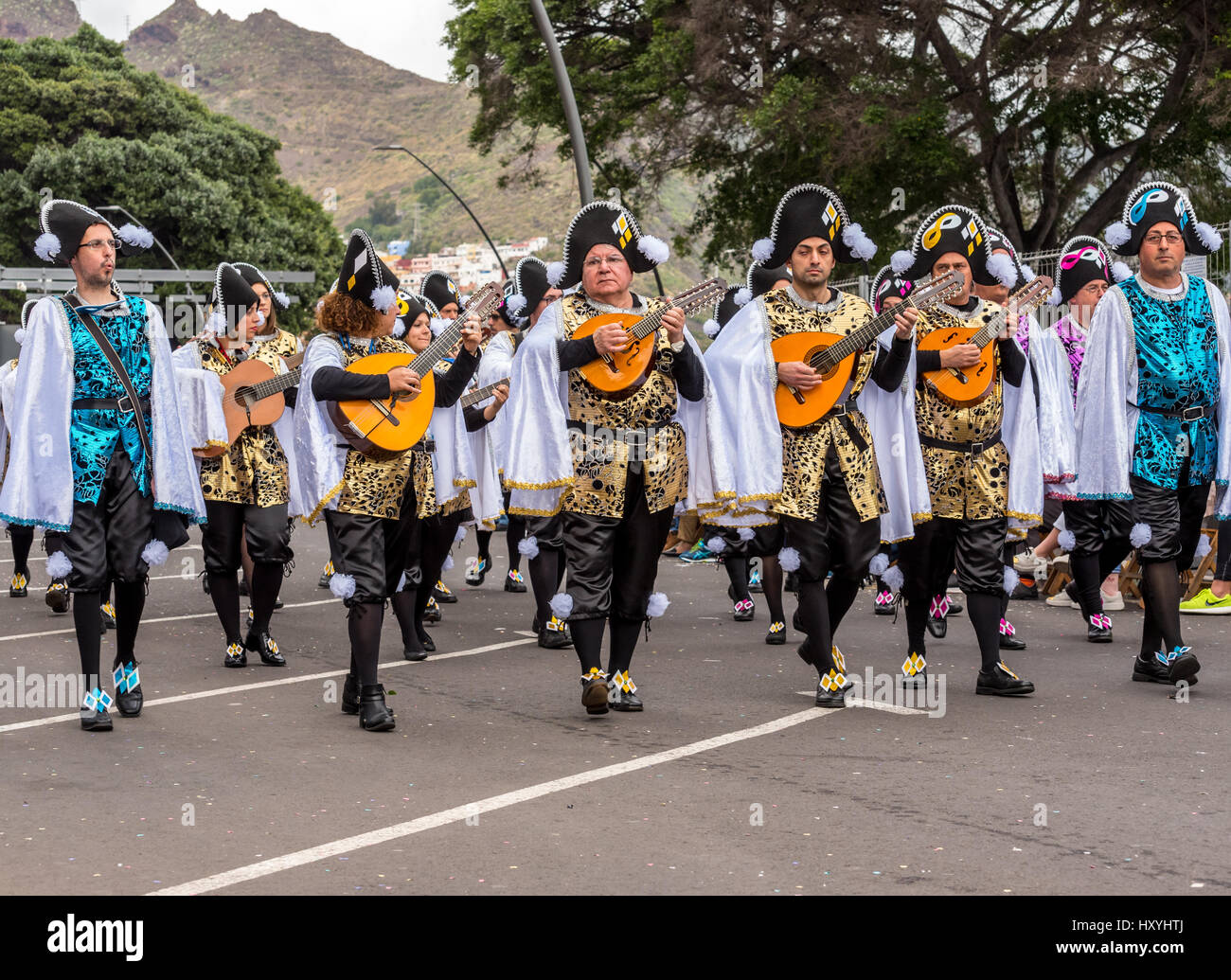 Group of male musicians with traditional instruments in very elaborate ...