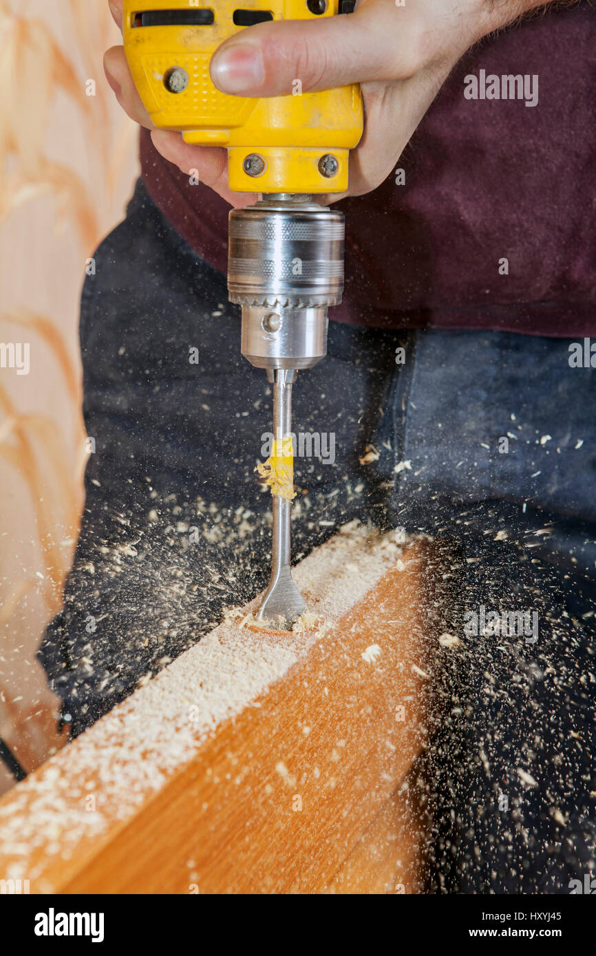 Door installation, Carpenter spade bit to drill through the edge of the ...