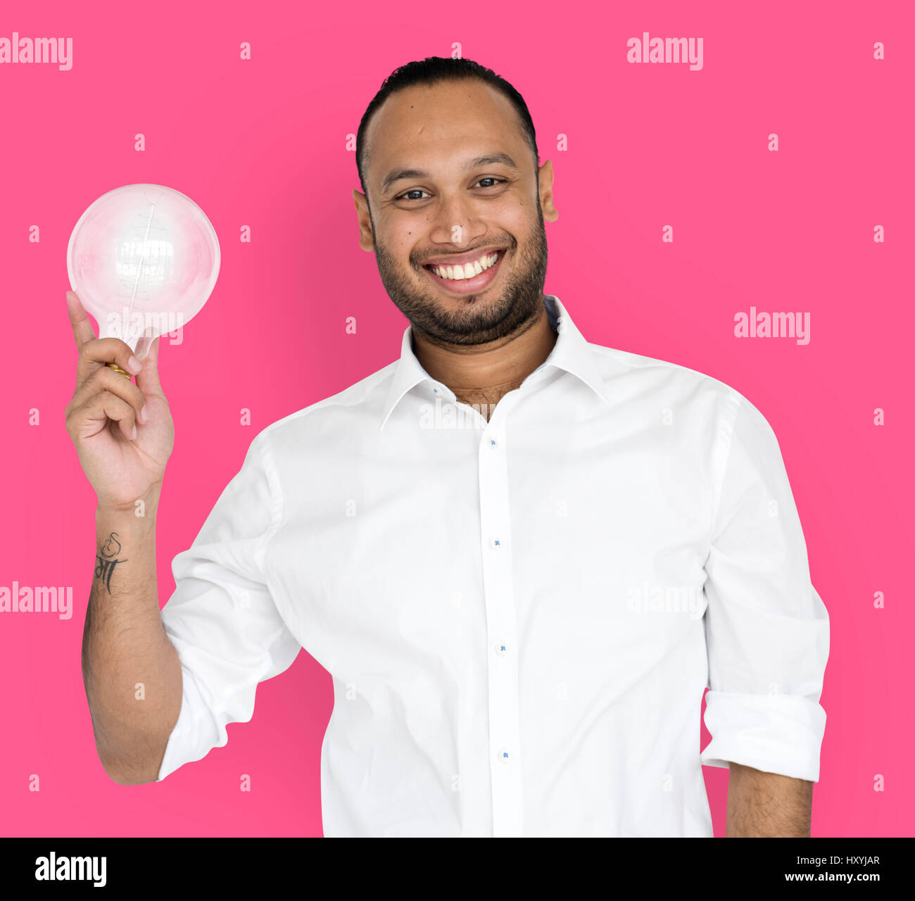 Indian Business Man Smiling Light Bulb Stock Photo - Alamy