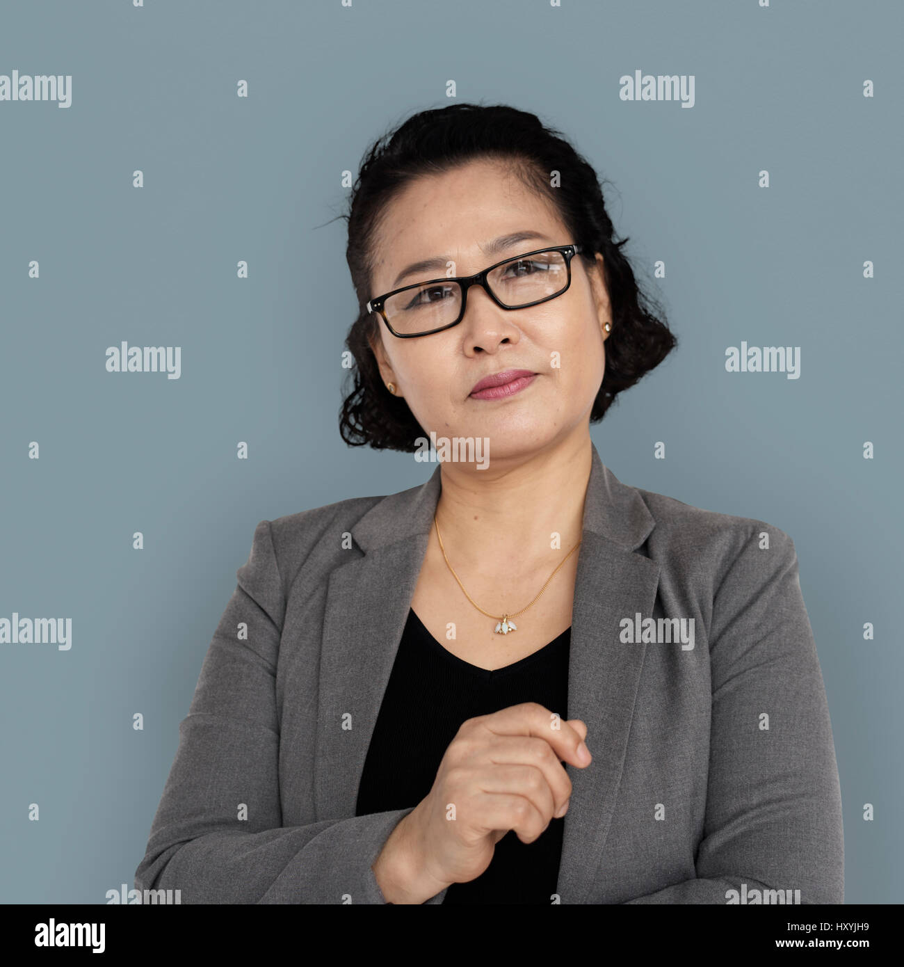 Asian business woman thinking hi-res stock photography and images - Alamy