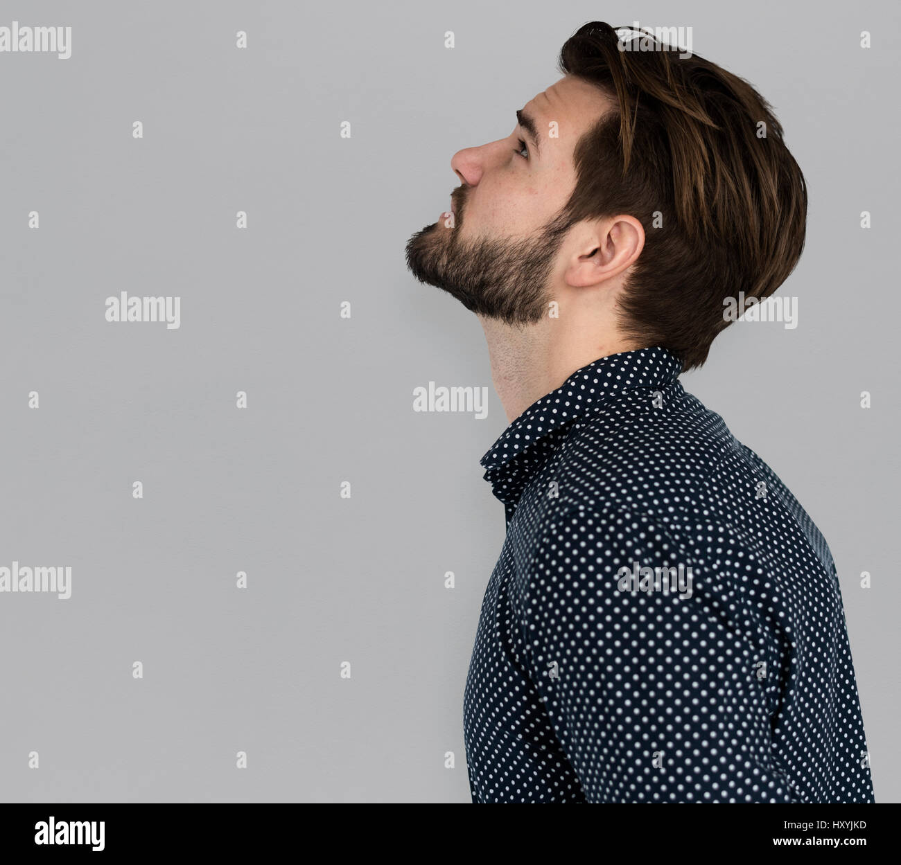Man Curious Thinking Look up SIde View Portrait Stock Photo - Alamy