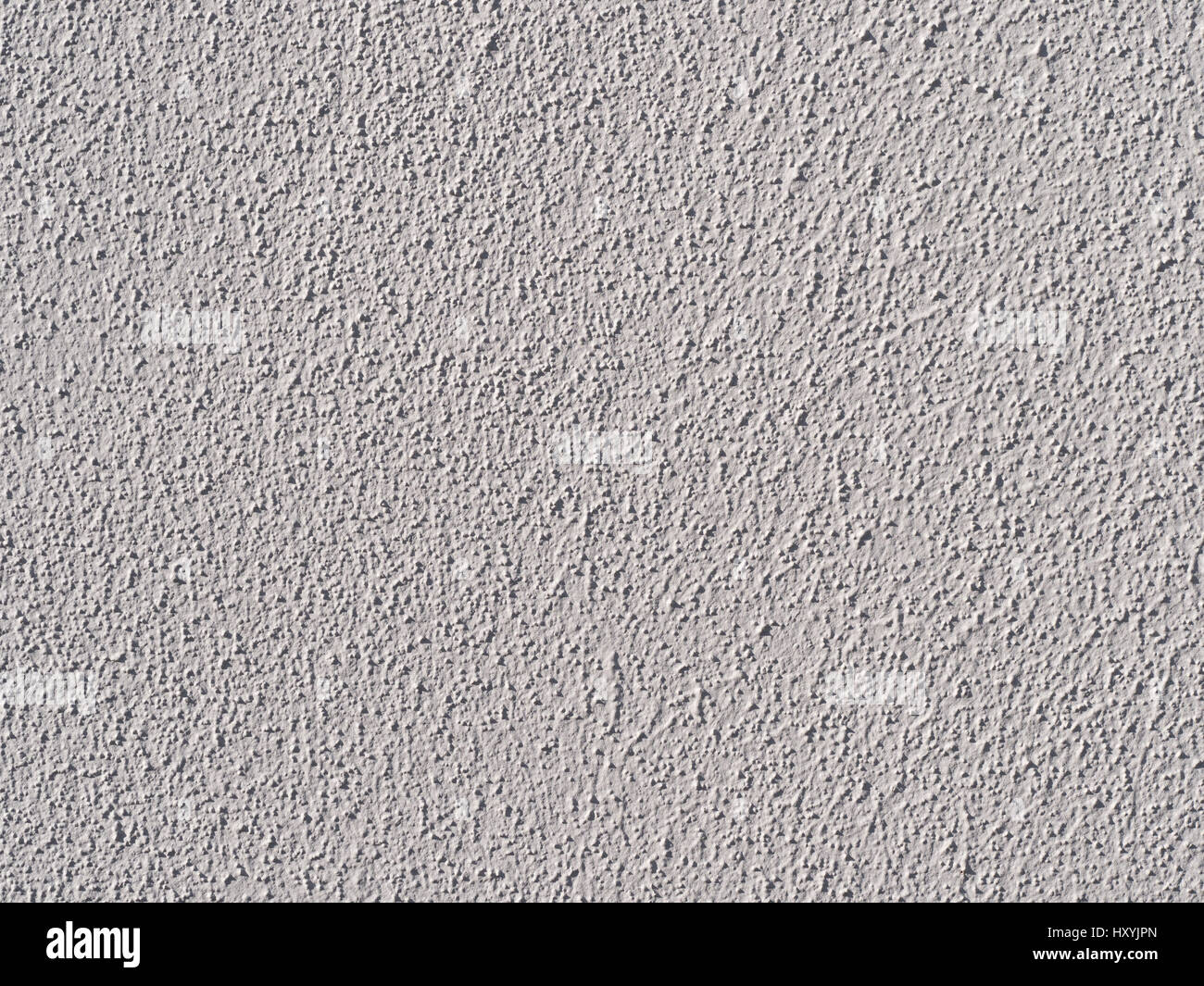 white painted wall with structural plaster closeup / macro in the ...