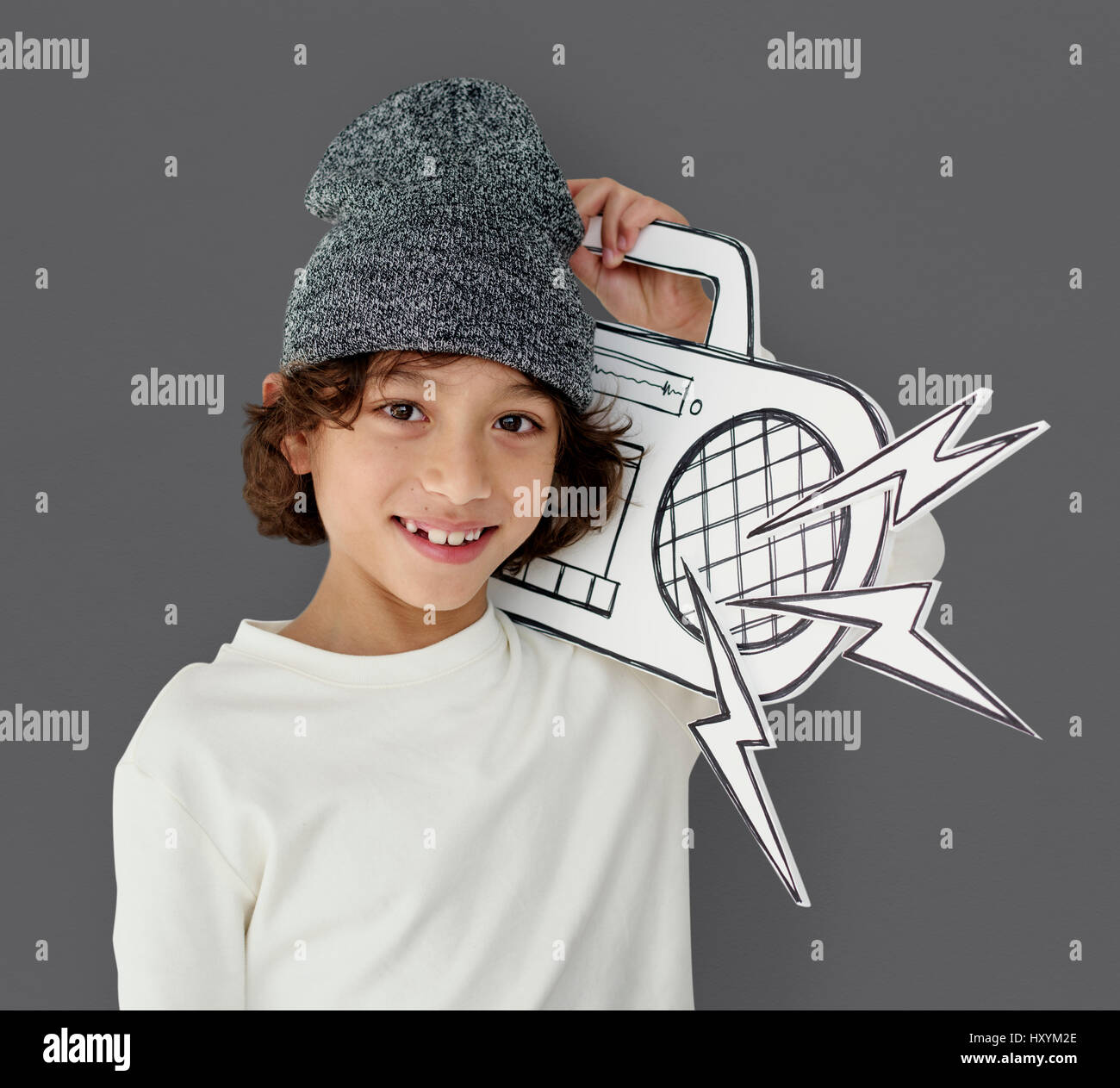 Little Boy Holding Jukebox Smiling Papercraft Stock Photo - Alamy