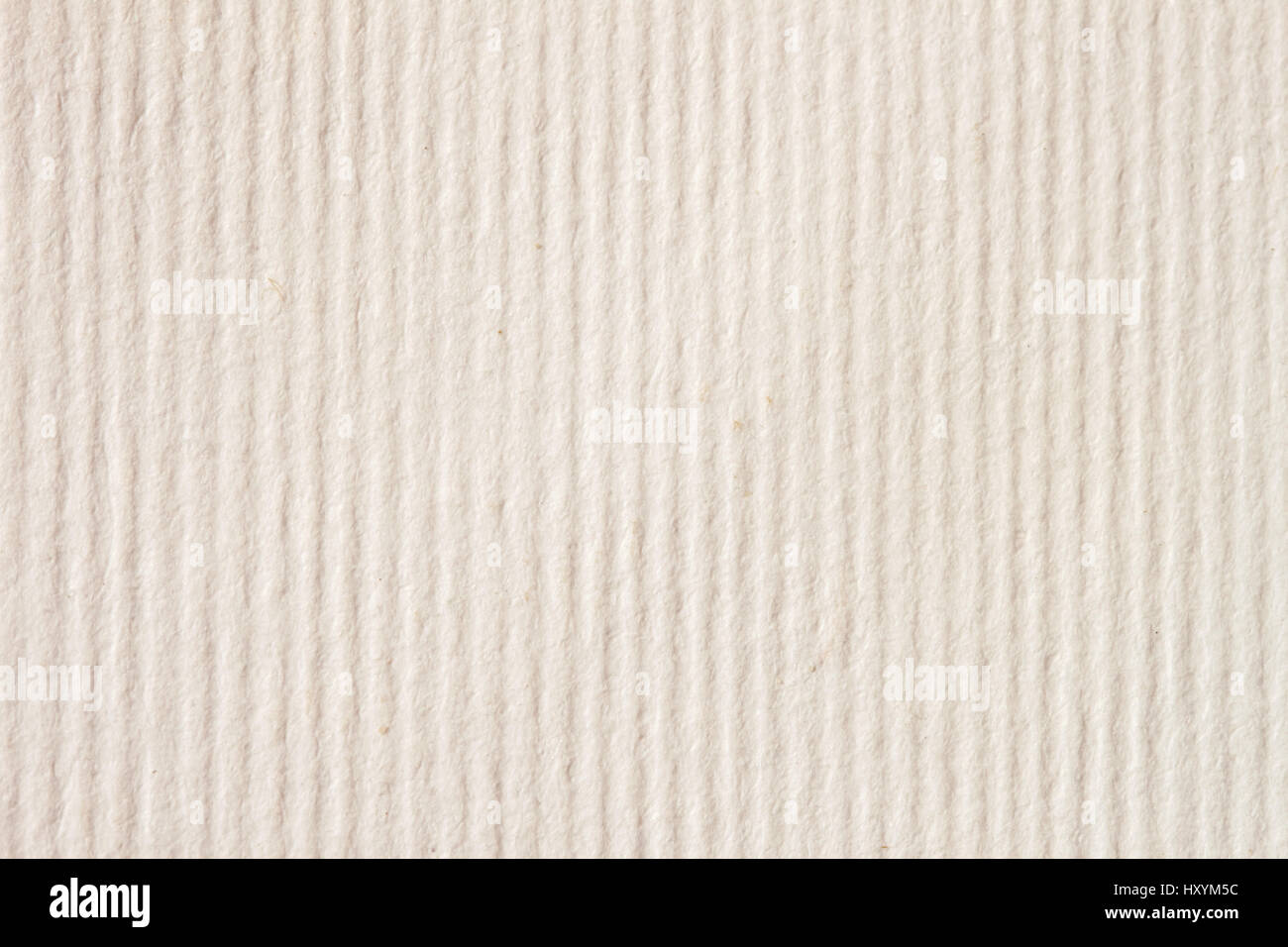 Texture of light cream striped paper close-up with small inclusions for ...