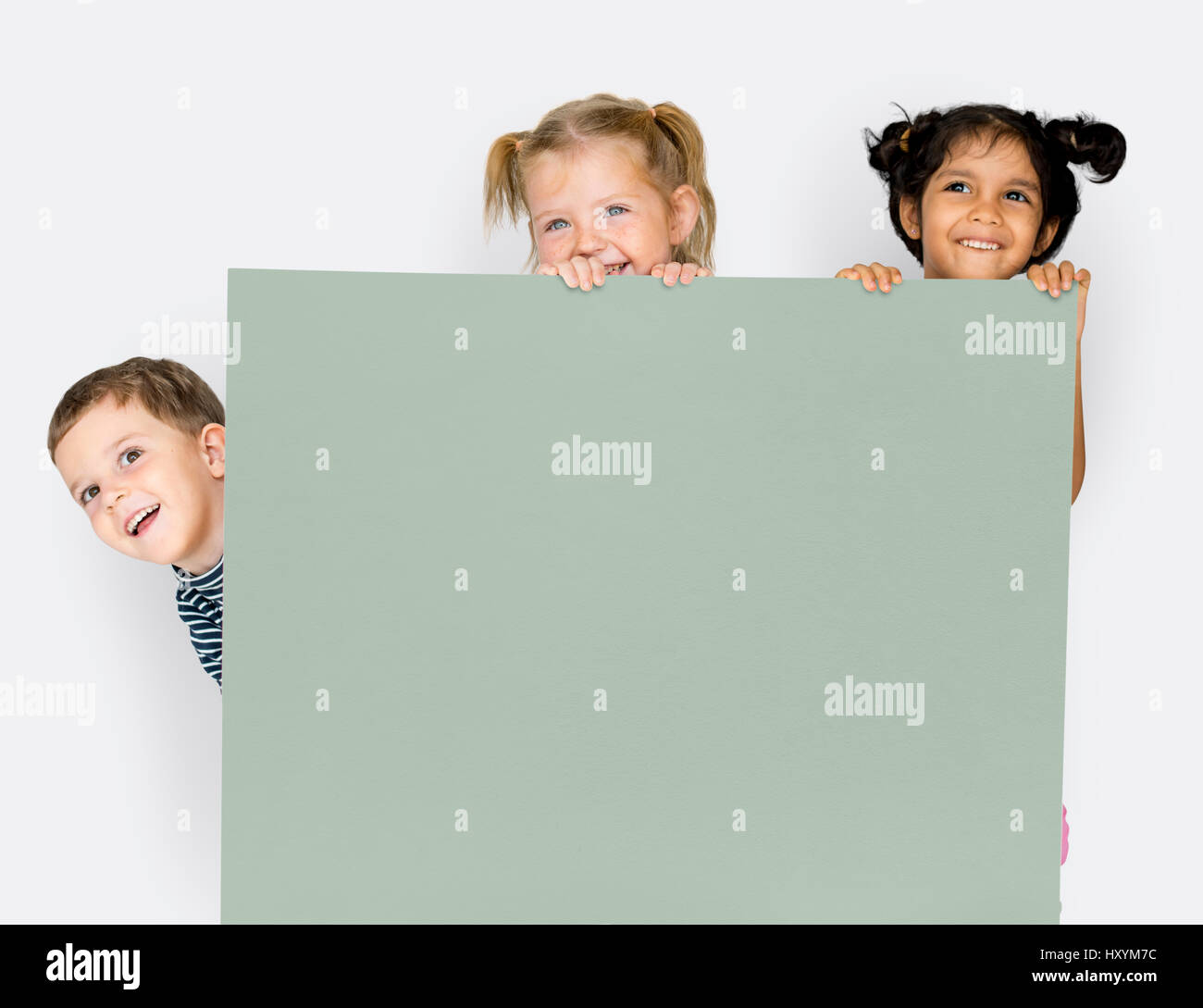 Little Children Holding Empty Paper Smiling Stock Photo - Alamy
