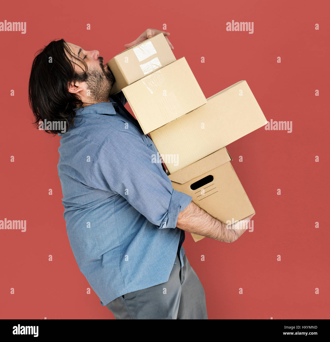 Man Carrying Box Parcel Package Overload Stock Photo - Alamy