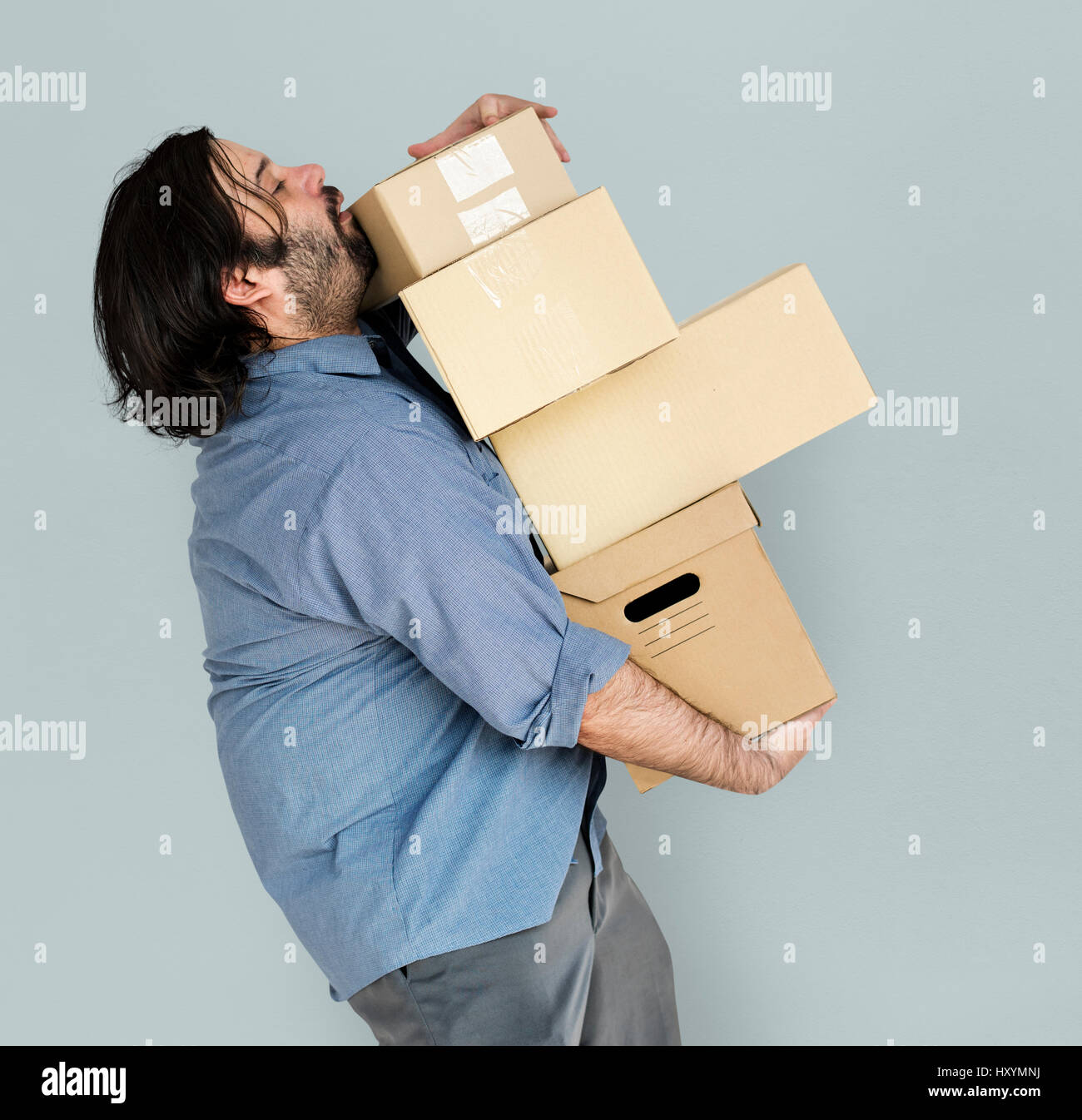Man Carrying Box Parcel Package Overload Stock Photo - Alamy