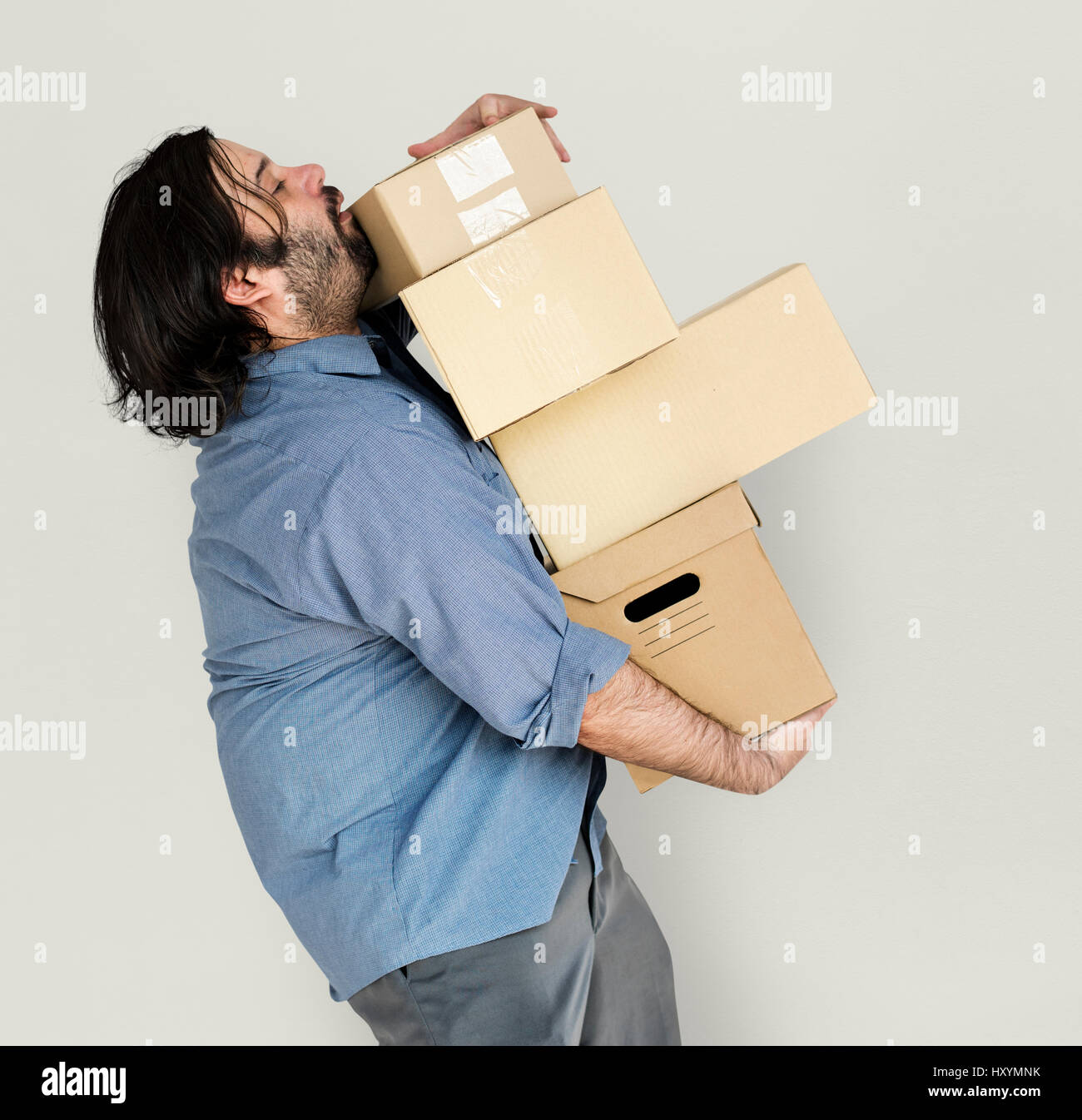 Man Carrying Box Parcel Package Overload Stock Photo - Alamy