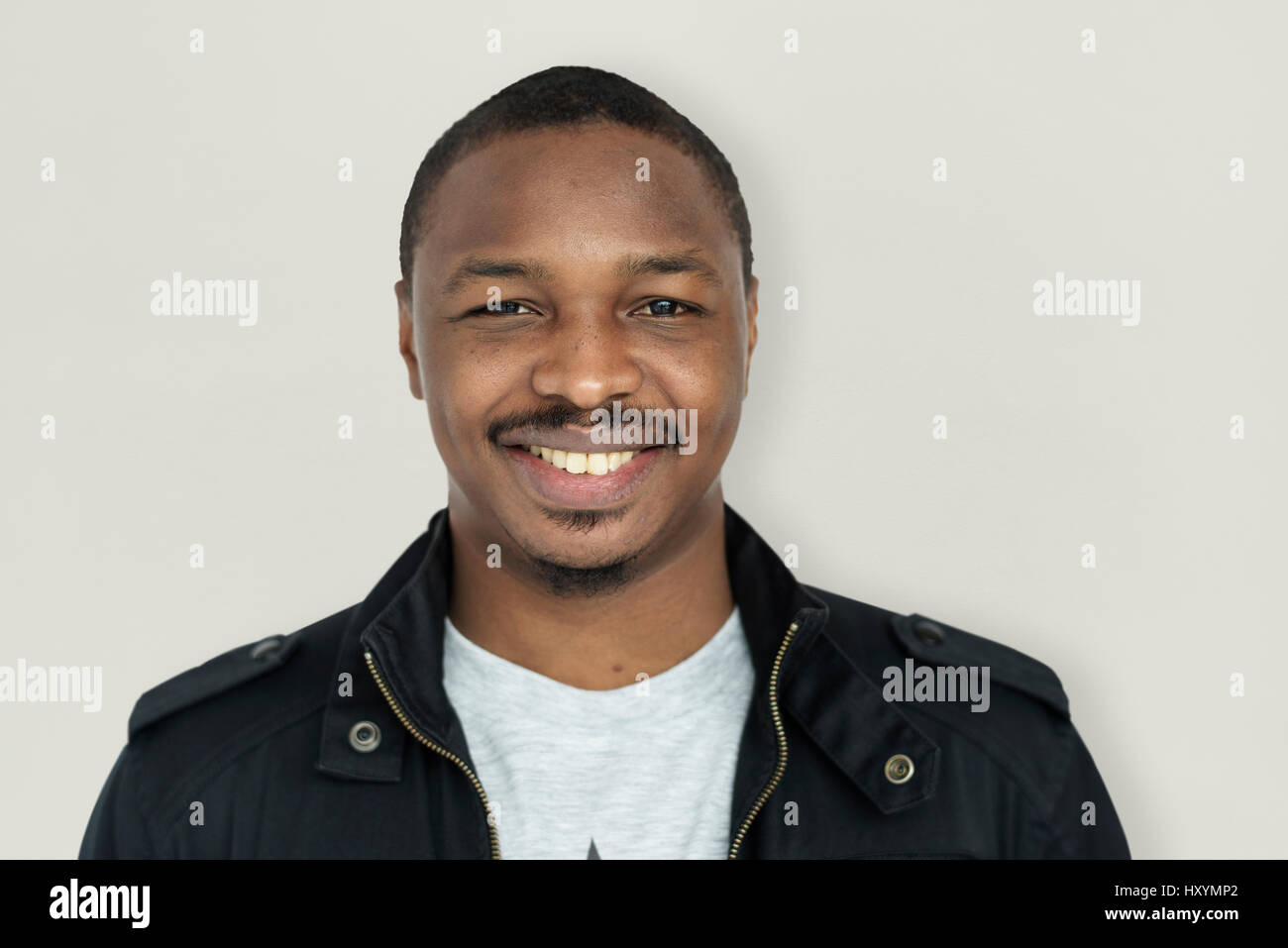 African Man Smiling Happiness Studio Portrait Stock Photo - Alamy