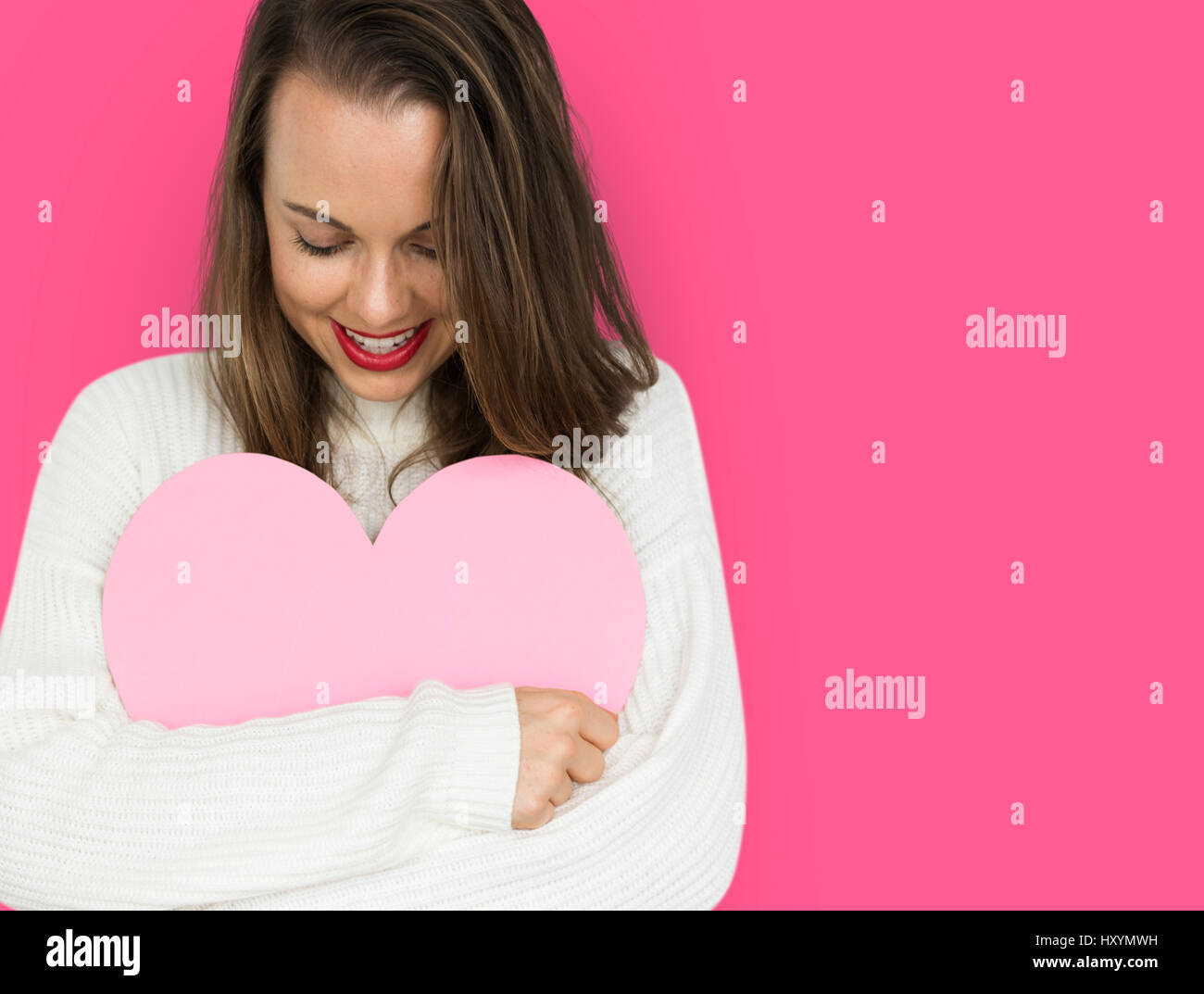 Young Lady Hugging Heart Love Stock Photo - Alamy