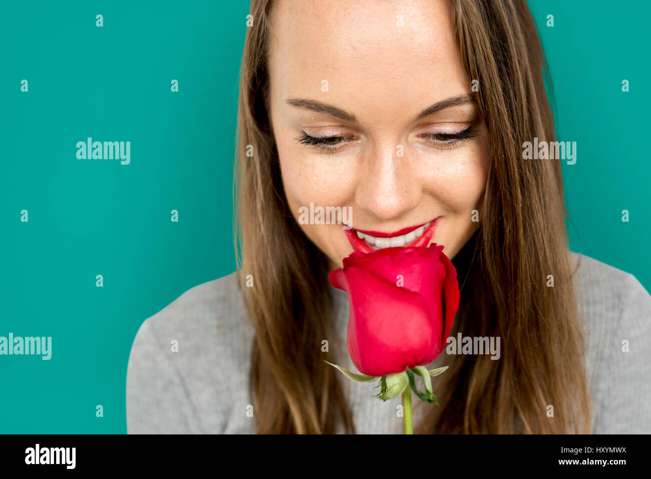 Young Lady Hugging Rose Smiling Stock Photo - Alamy