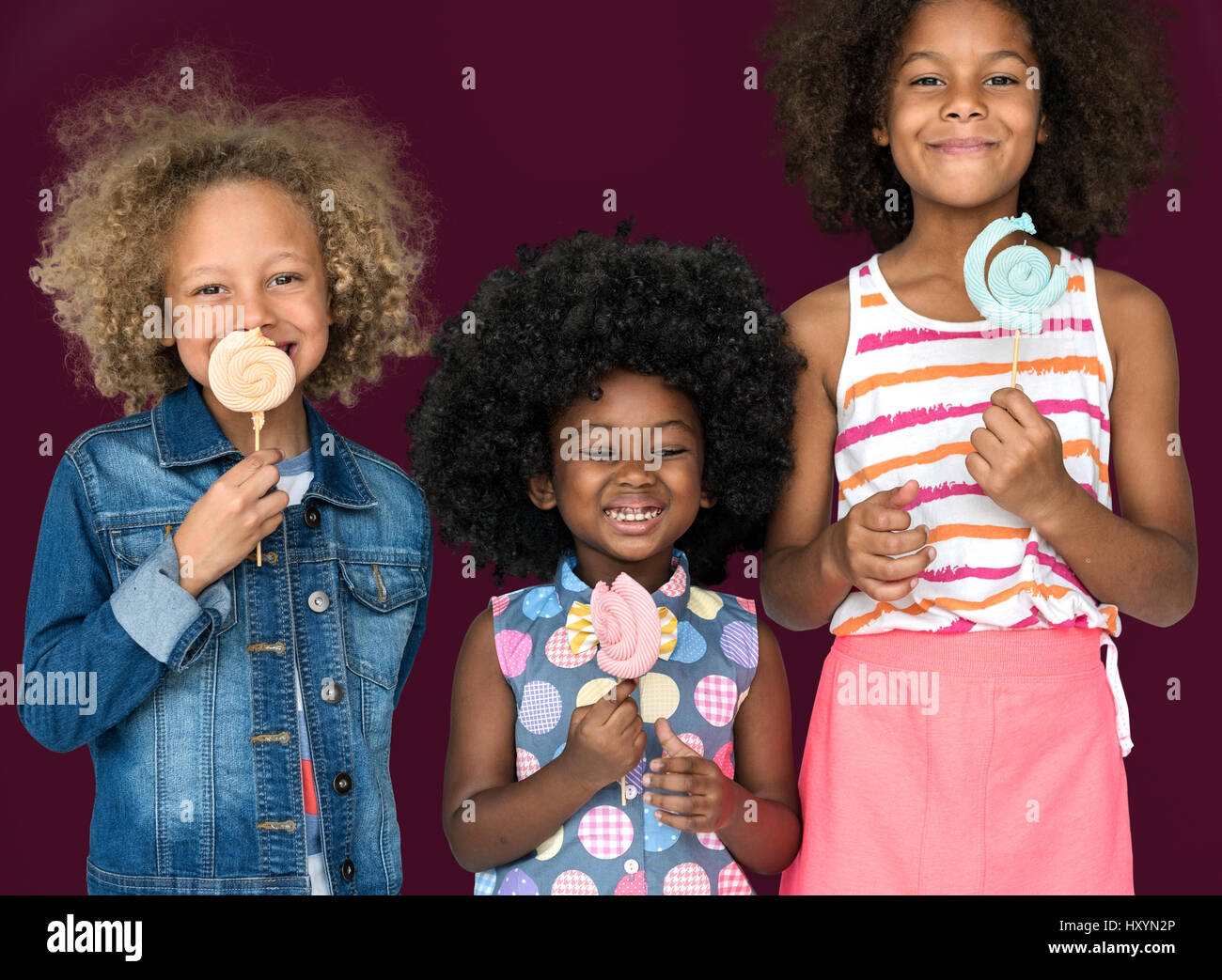 Little Children Eating Lollipop Candy Smile Stock Photo - Alamy