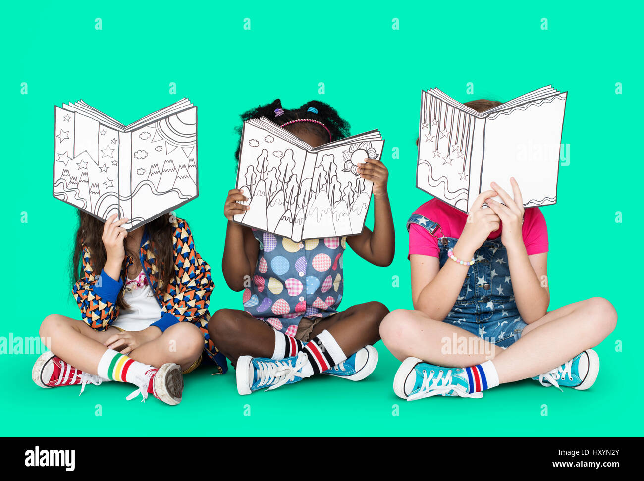 Little Children Reading Story Books Stock Photo - Alamy