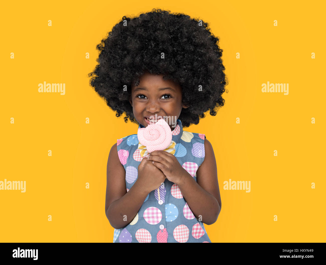 African Descent Child Lollipop Candy Stock Photo - Alamy