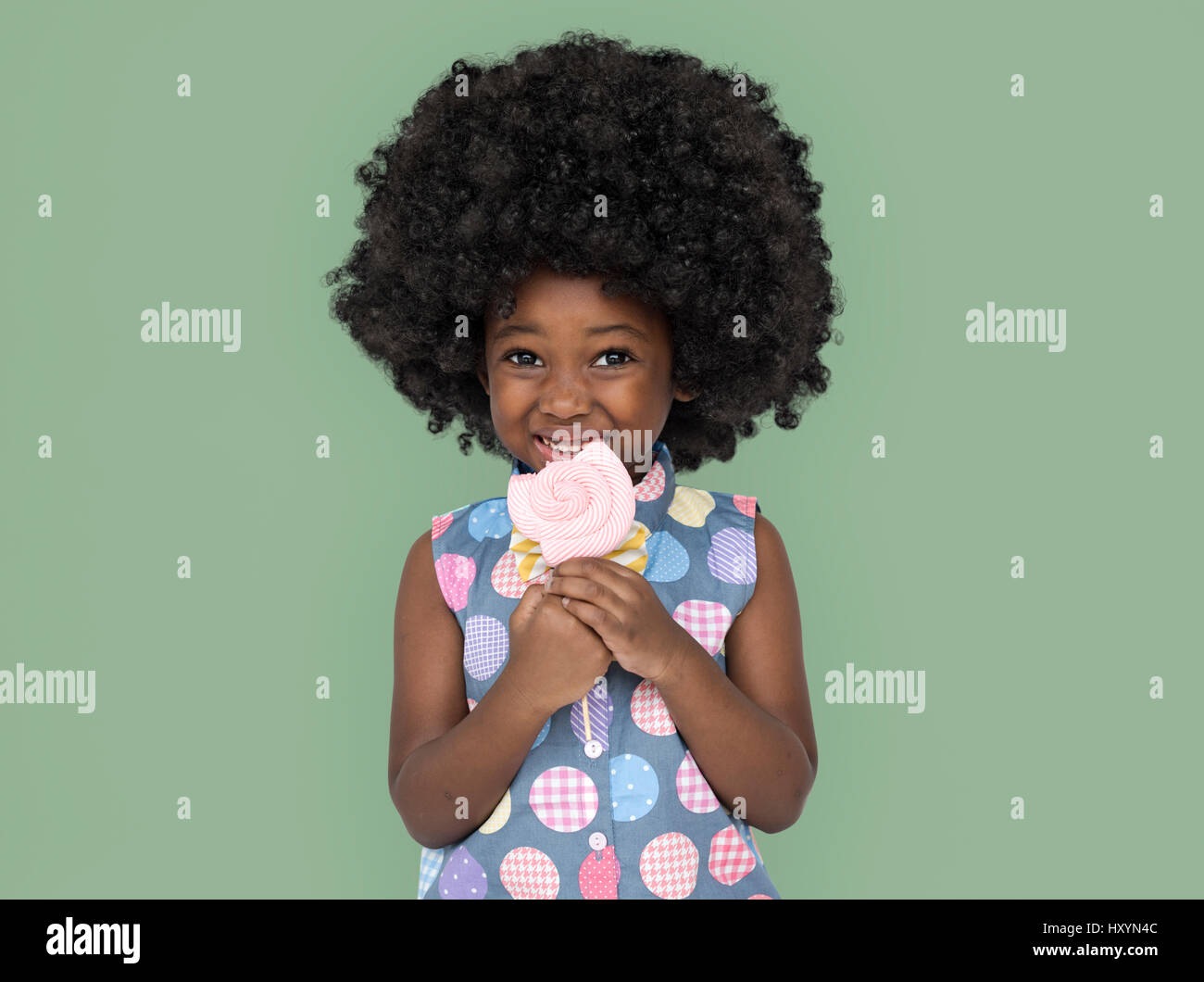 African Descent Child Lollipop Candy Stock Photo - Alamy