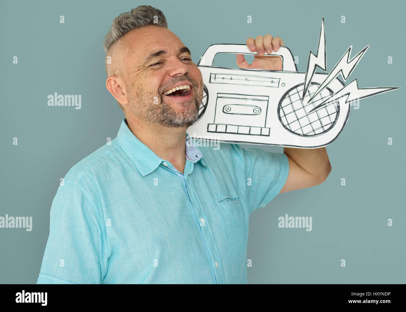 Caucasian Man Holding Paper Crafted Jukebox Stock Photo - Alamy