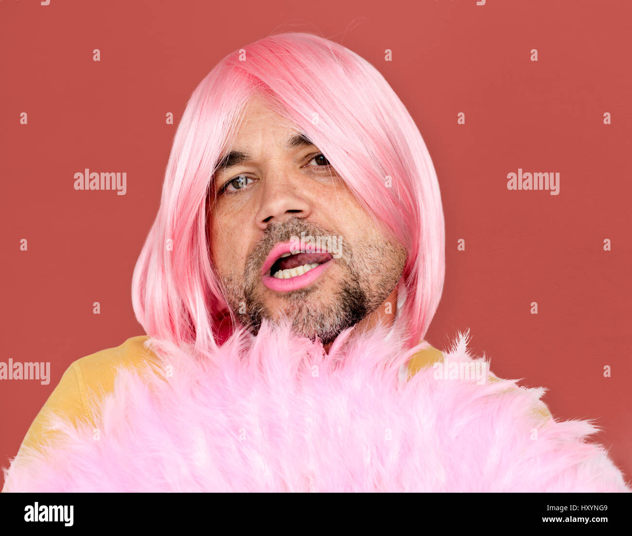 Man pink wig hi-res stock photography and images - Alamy