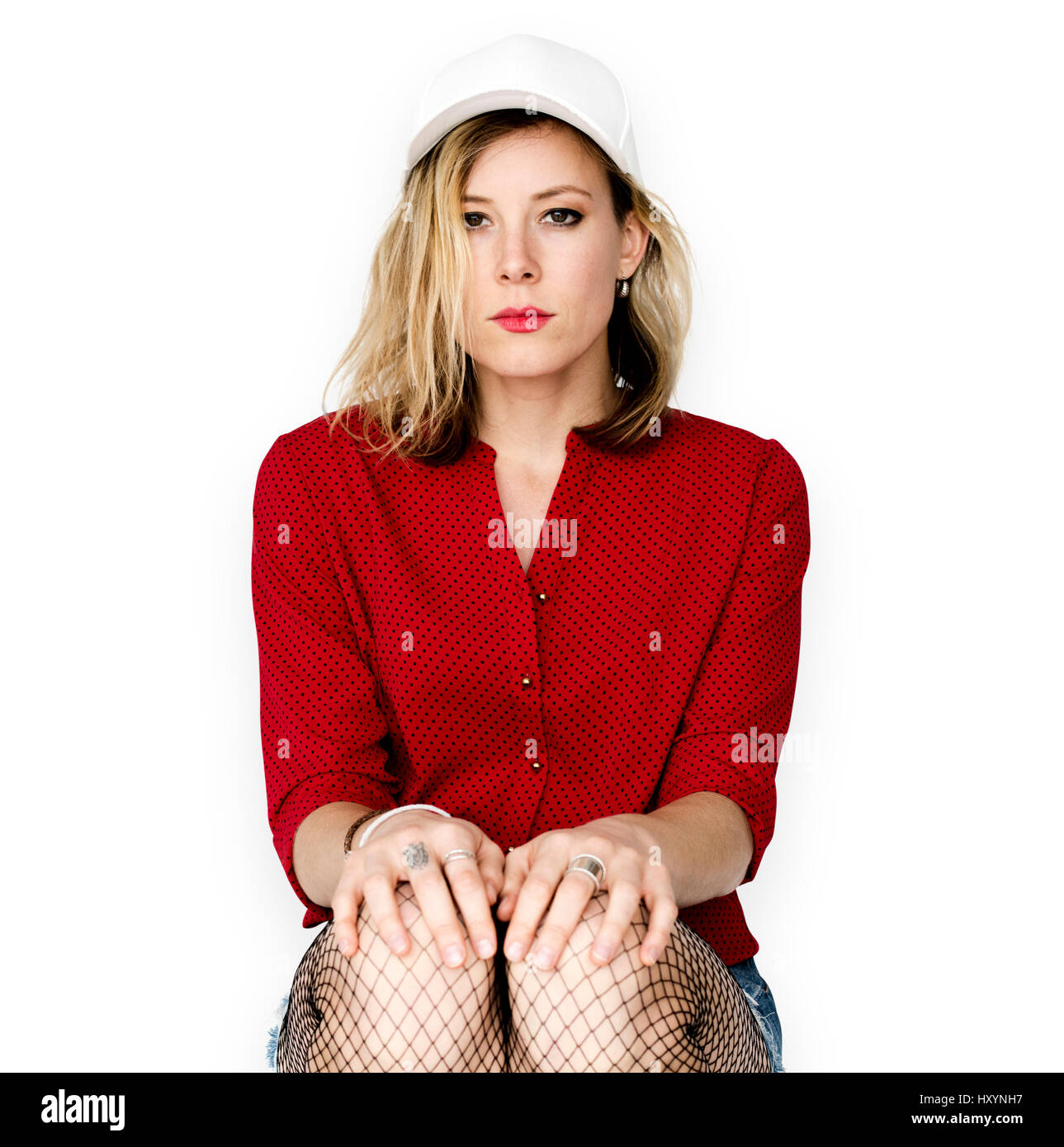 White hat sitting hi-res stock photography and images - Alamy