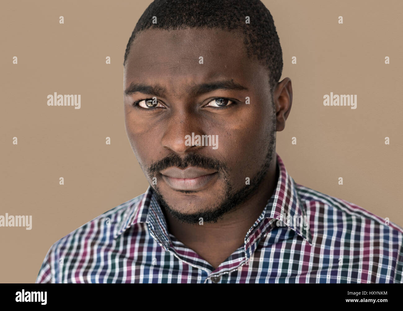African Descent Man Focused Serious Stock Photo - Alamy