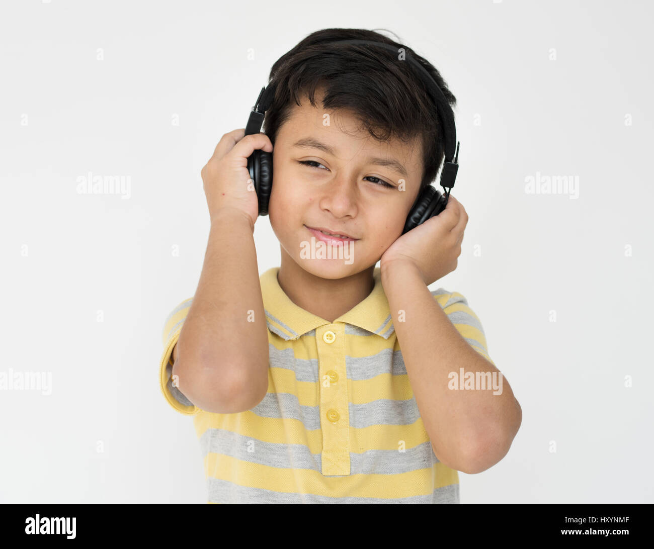Kid Studio Shoot Listening Music Connection Stock Photo - Alamy