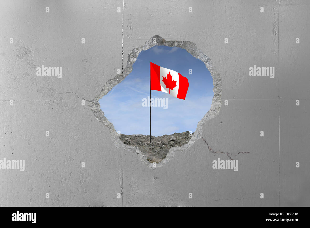 Canadian flag behind a concrete wall Stock Photo - Alamy