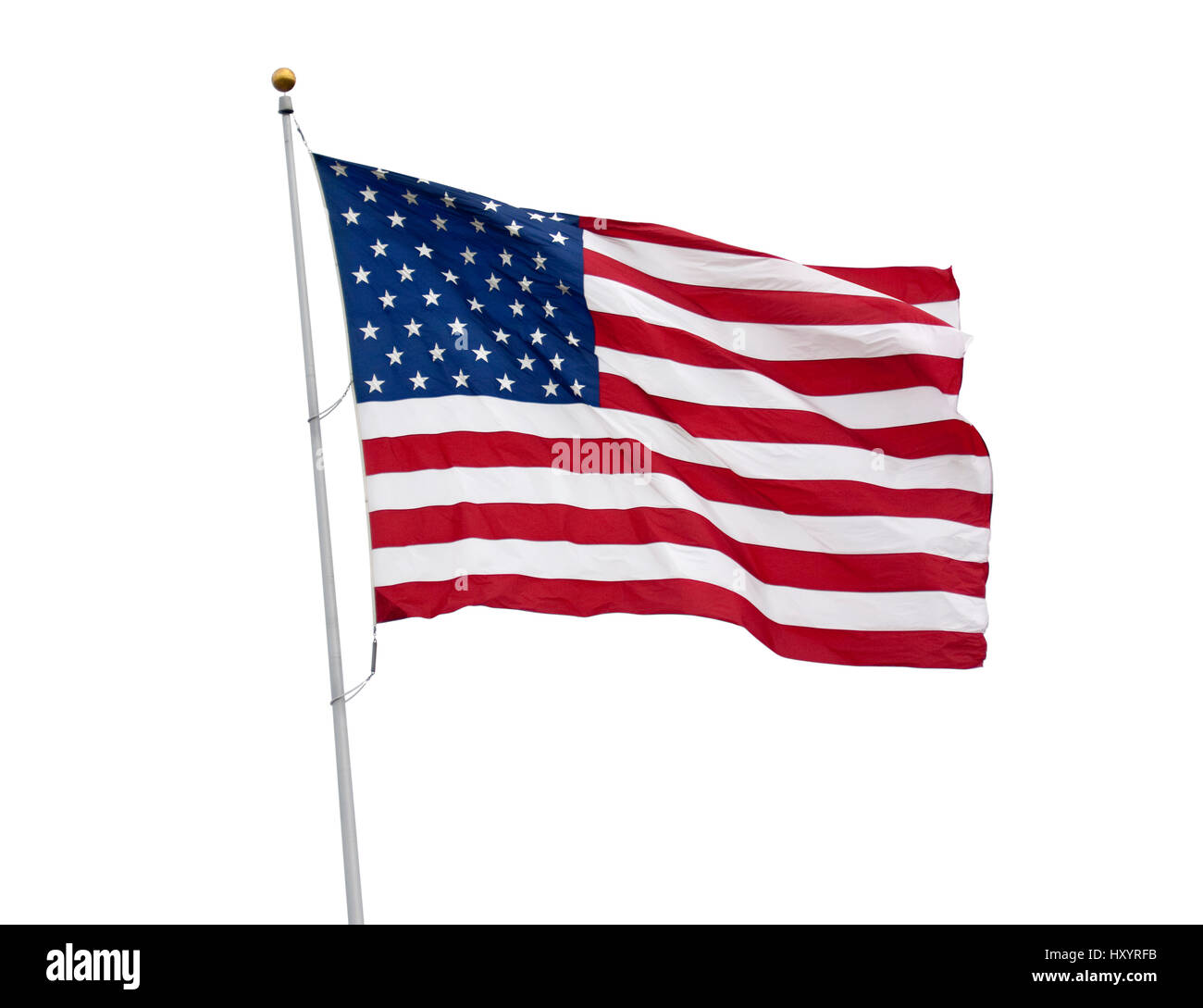 An American flag flying in the breeze isolated on white with a clipping ...