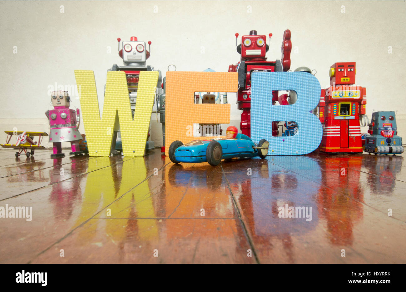the word WEB on wooden floor with reto robots Stock Photo - Alamy