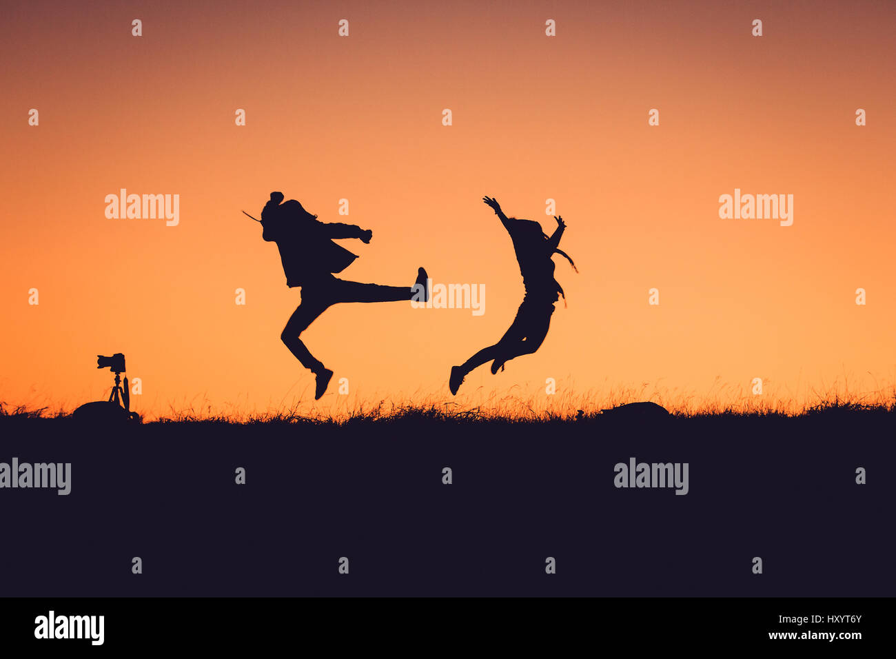 Silhouette Of People having fun at sunset time Stock Photo - Alamy