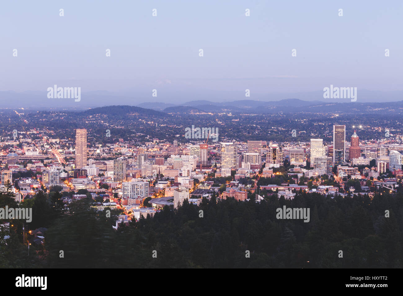 Wide city view of Portland, Oregon with Mount Hood in the background ...