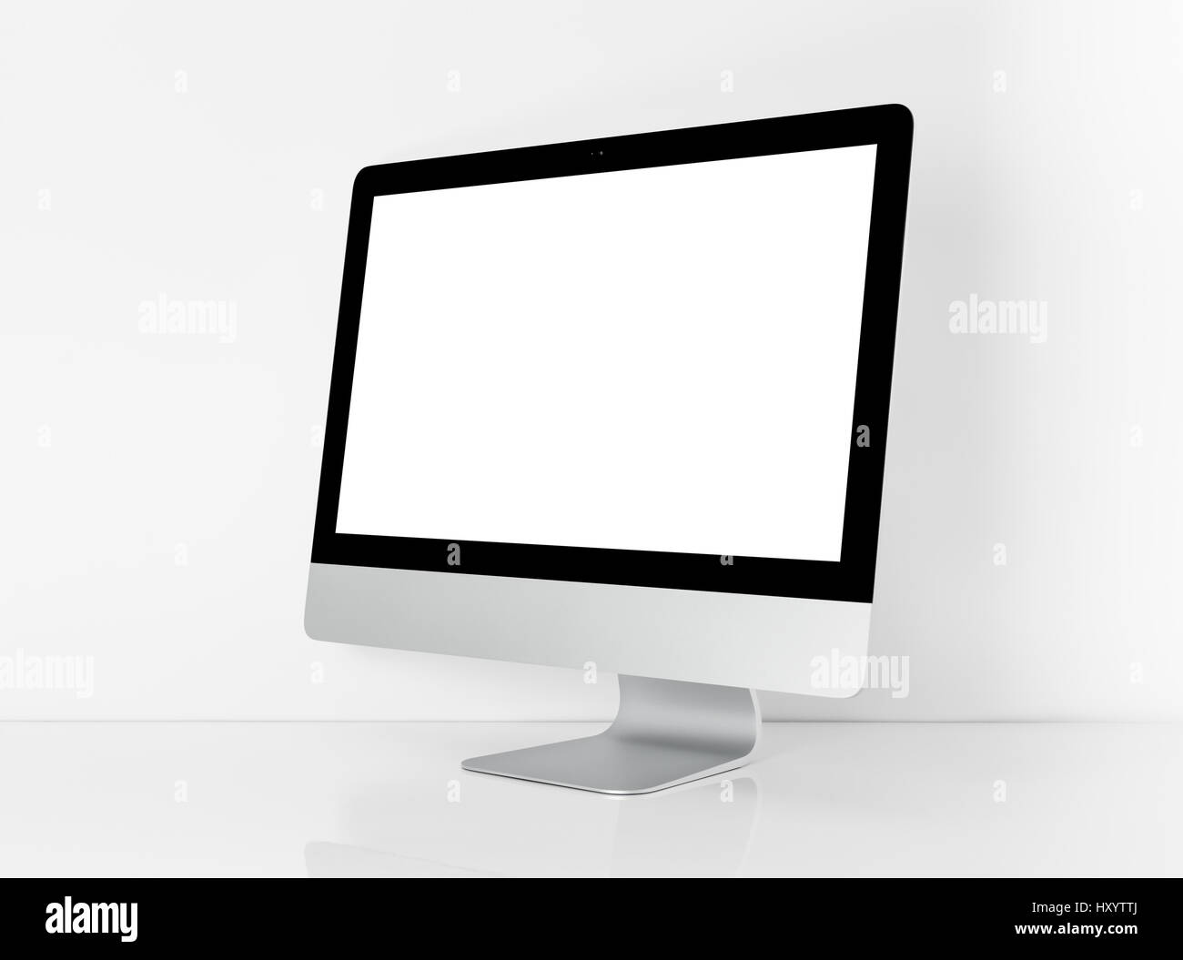 Computer display with blank white screen at the desk Stock Photo - Alamy