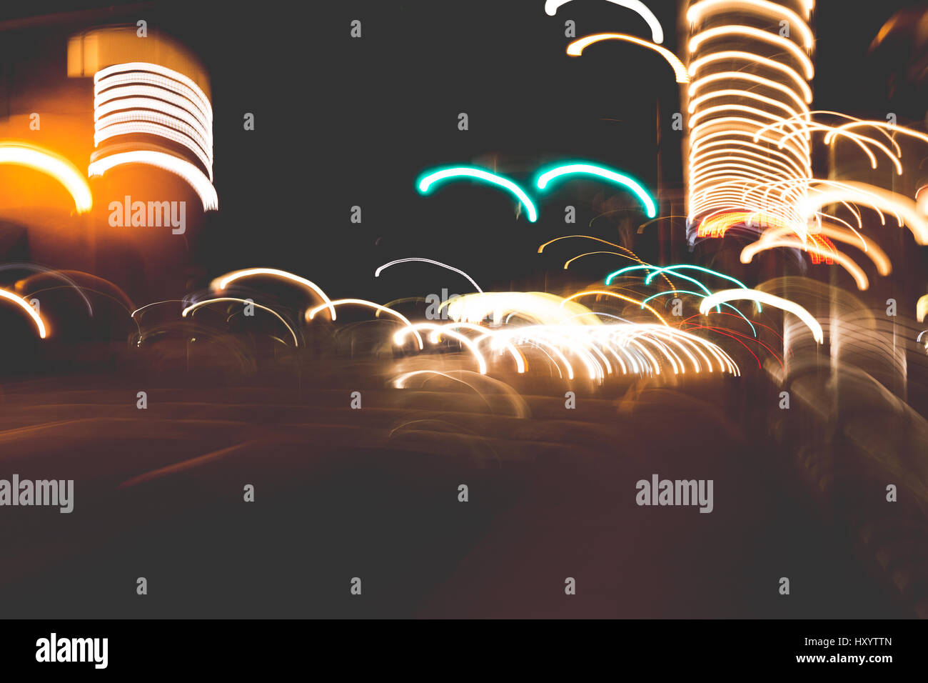 Blurred motion light streaks in downtown city street Stock Photo - Alamy