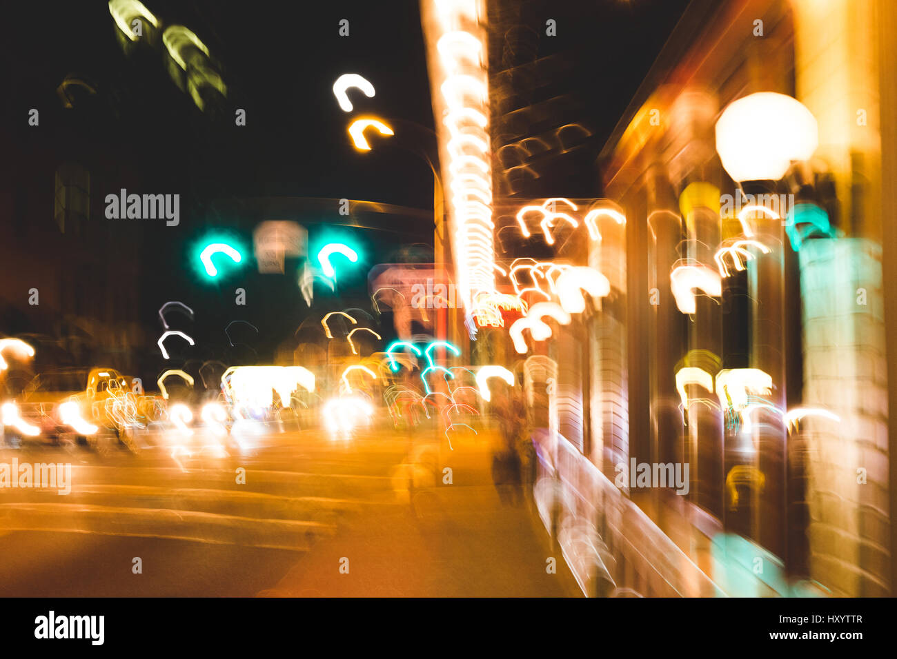 Blurred motion light streaks in downtown city street Stock Photo - Alamy