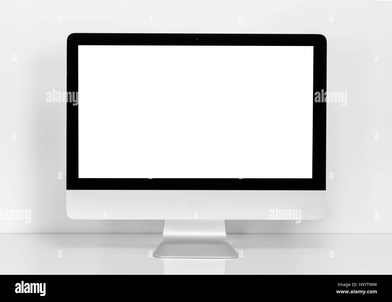 Computer display with blank white screen at the desk Stock Photo - Alamy