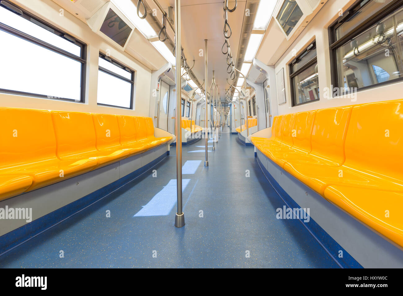 Empty interior of electric train cabin Stock Photo - Alamy