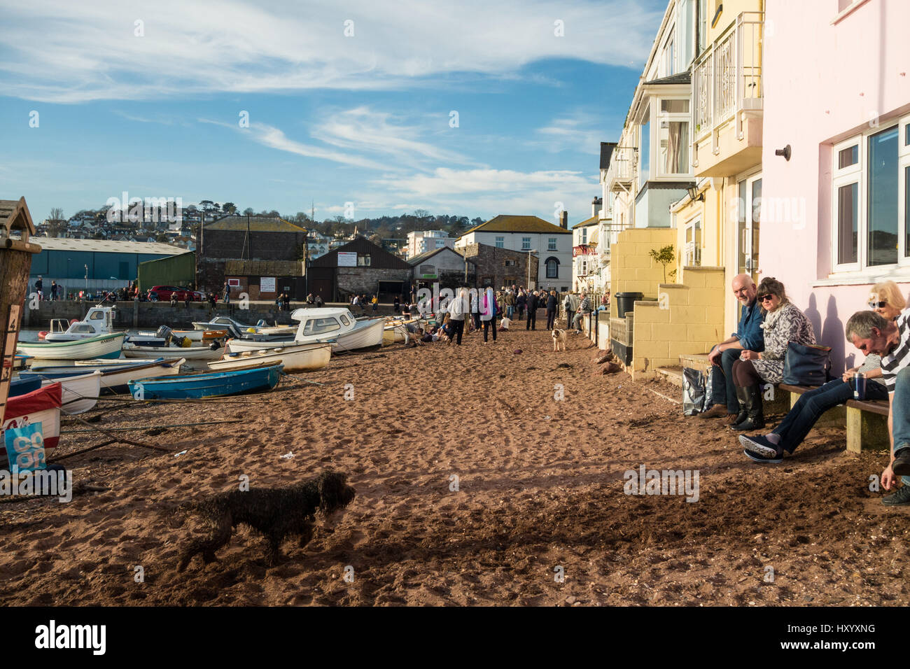 The back beach at Teignmouth on the River Teign estuary. Boats and ...